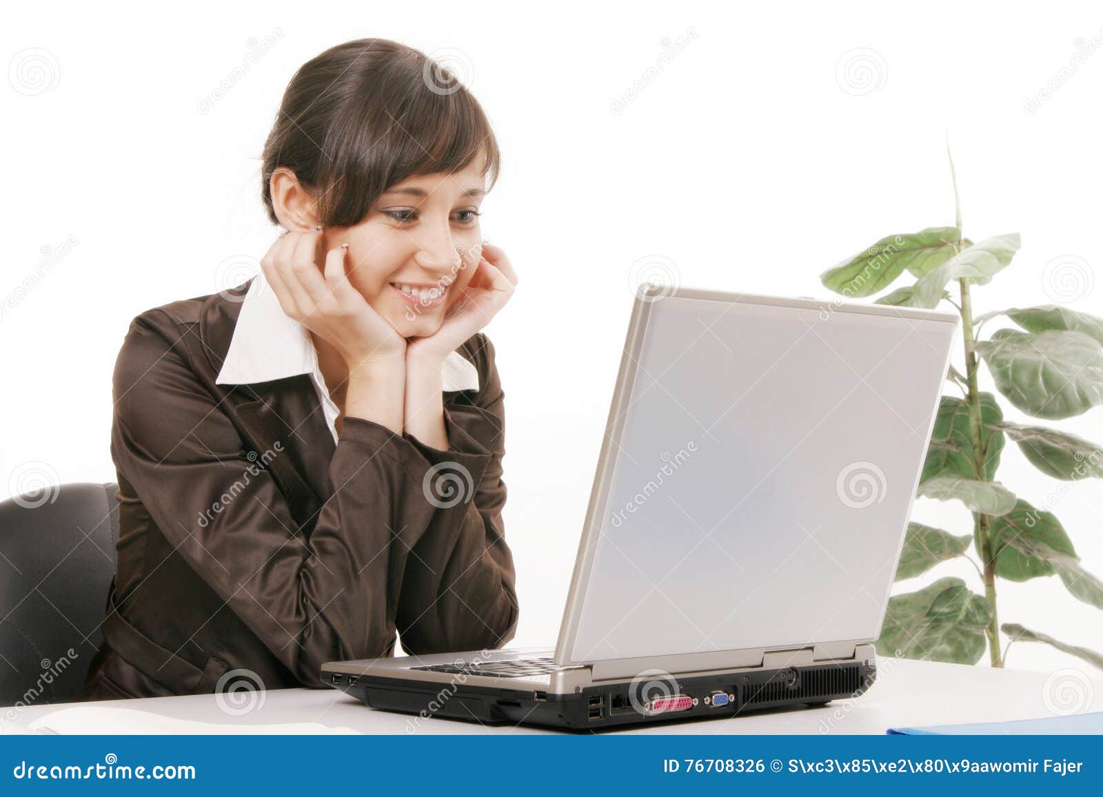 Young woman using computer stock photo. Image of laptop - 76708326