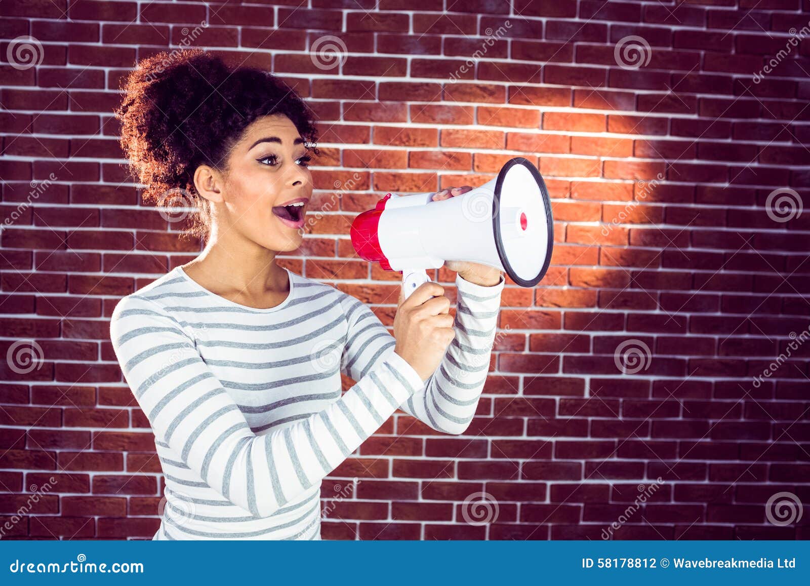 Young Woman Using Her Megaphone in the Light Stock Photo - Image of ...