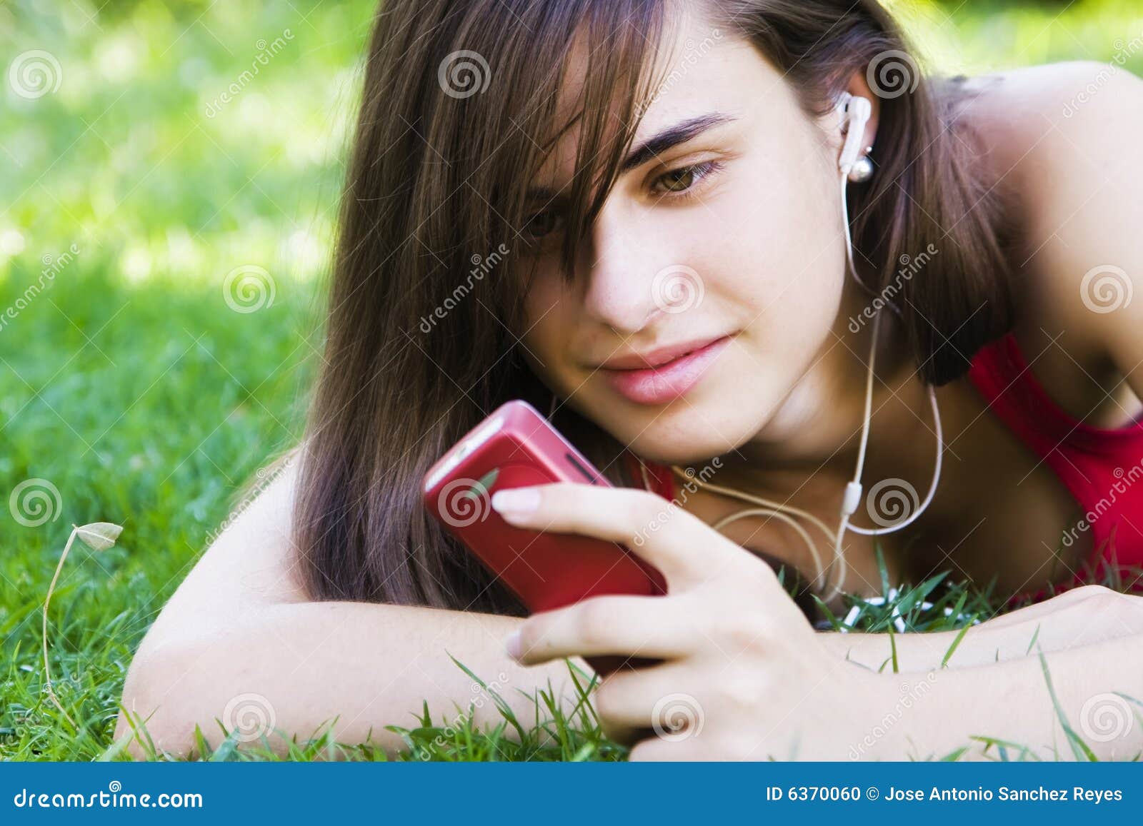 Young Woman Using Her Phone Stock Photo - Image of mobile, conversation ...