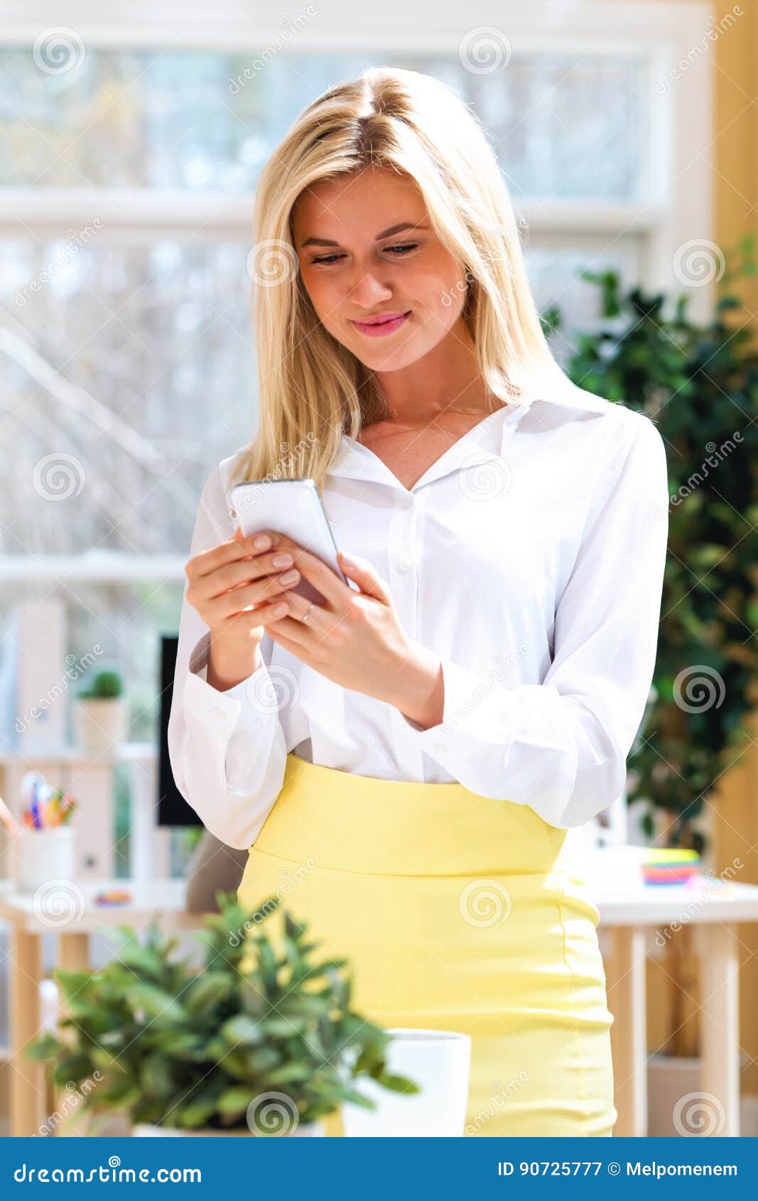 Young Woman Using Her Phone Stock Image - Image of happiness, person ...