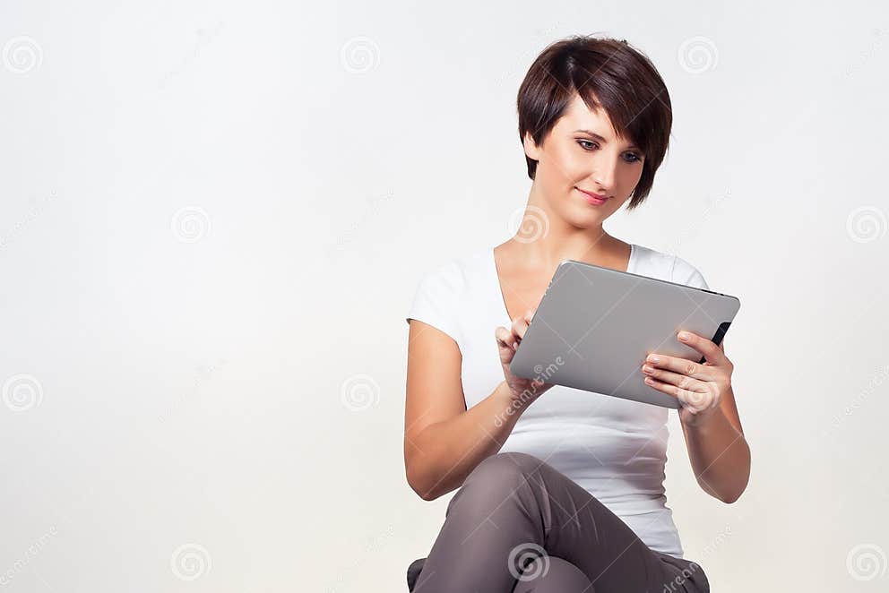 Young woman using iPad stock image. Image of device, businesswoman ...