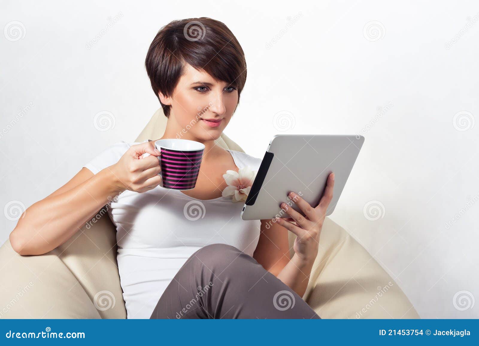 Young woman using iPad stock photo. Image of portrait - 21453754