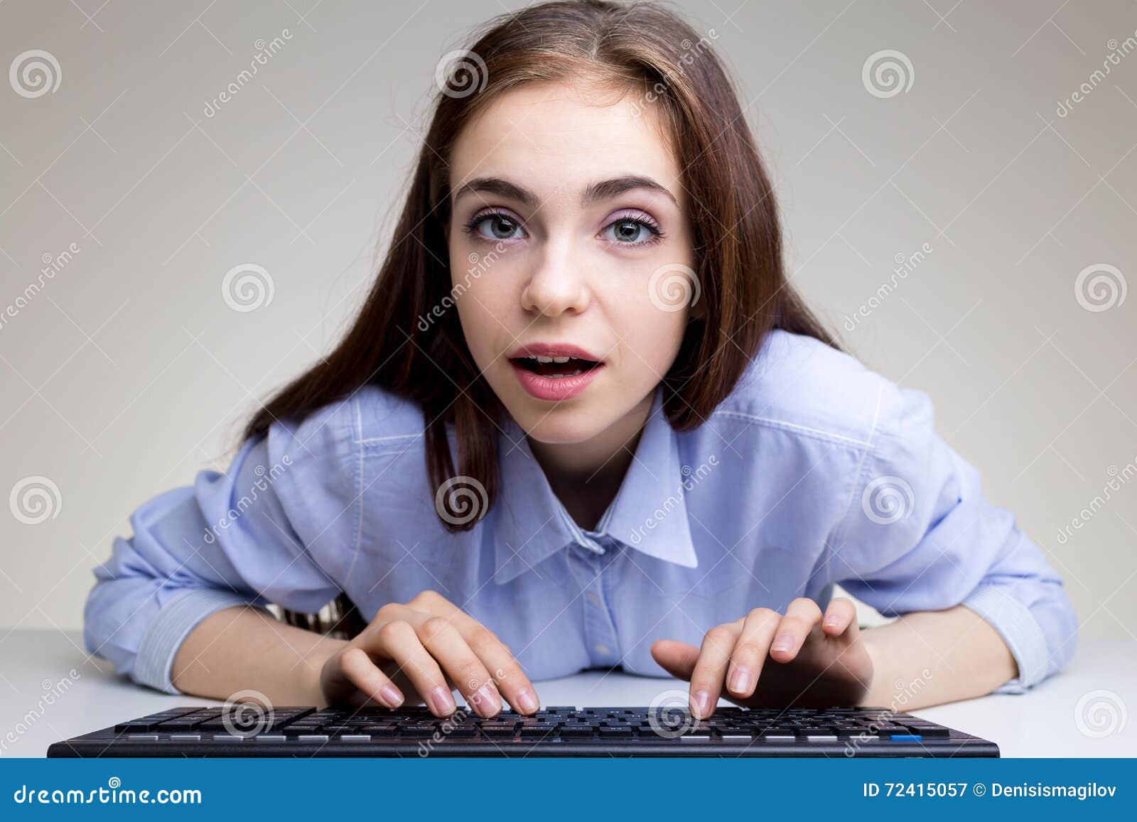 Young woman using keyboard stock image. Image of device - 72415057