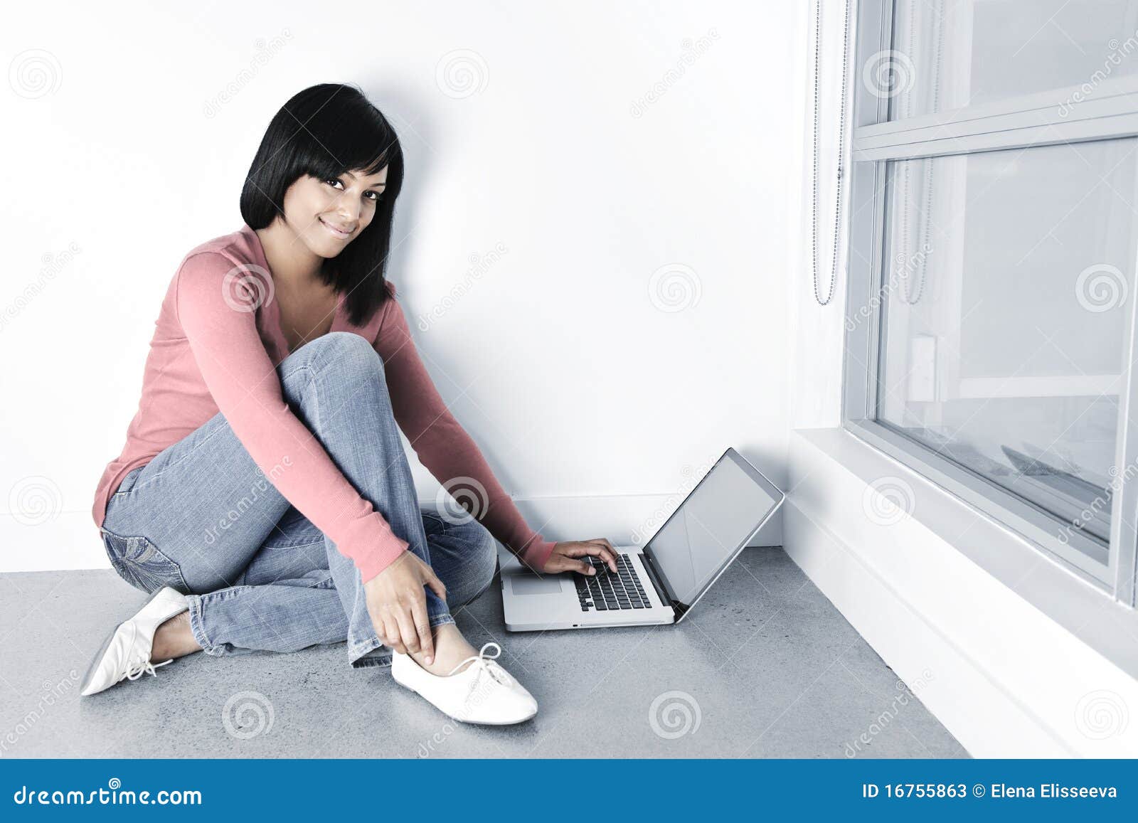 Young Woman Using Laptop Computer on Floor Stock Image - Image of mixed ...