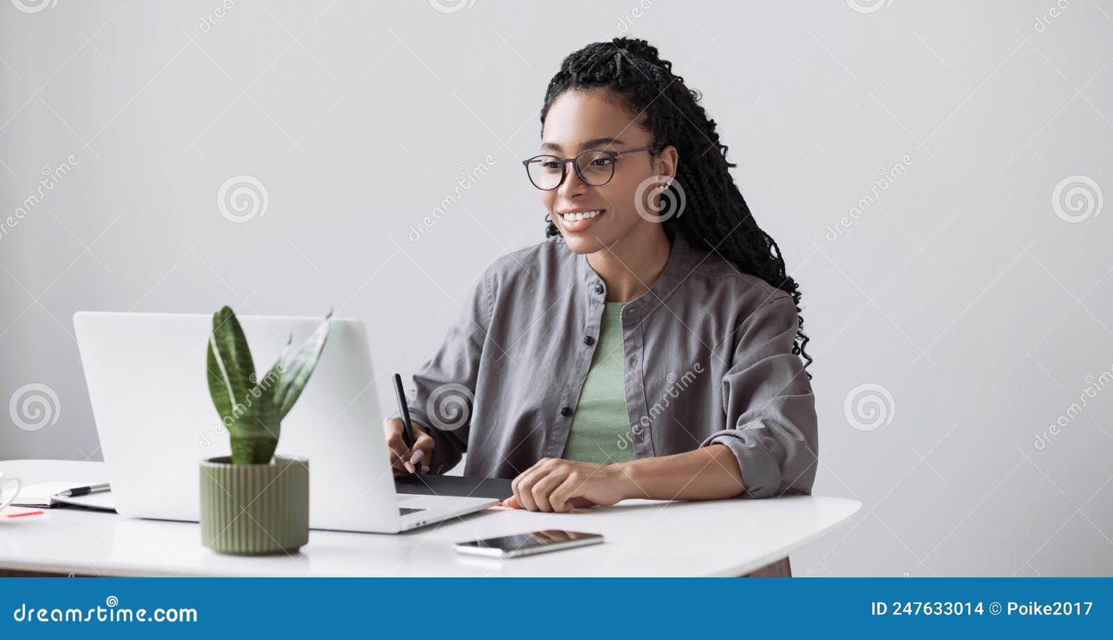 Young Woman Using Laptop Computer at Office Panoramic Banner, Student ...
