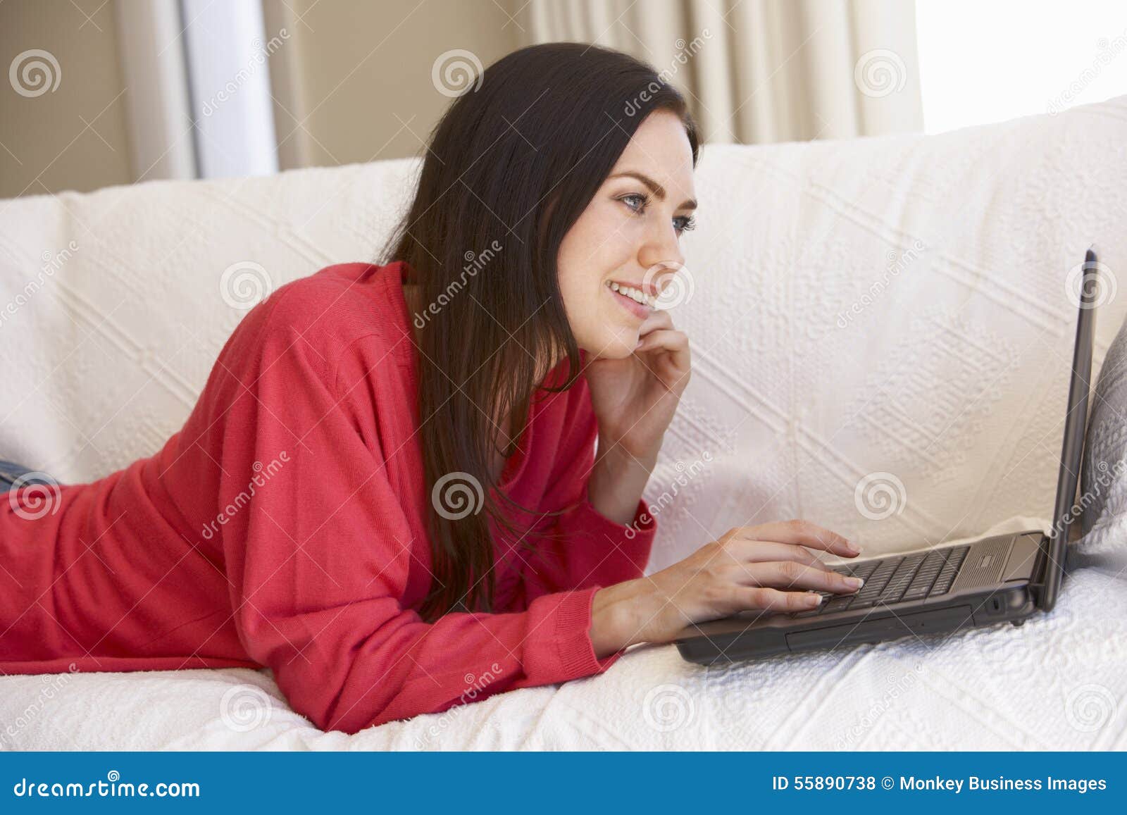 Young Woman Using Laptop at Home Stock Photo - Image of pretty, woman ...