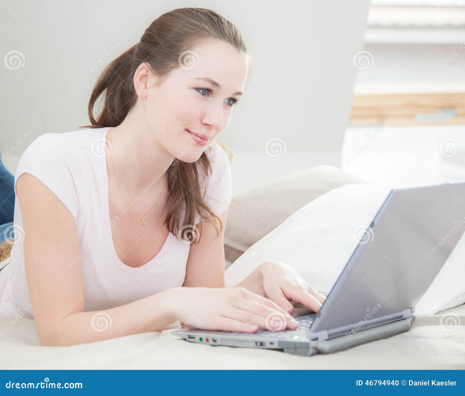 Young Woman Using Laptop at Home Stock Photo - Image of online ...