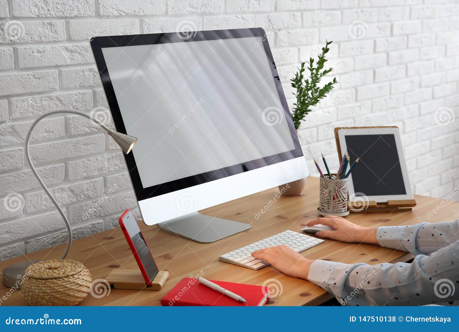 Young Woman Using Modern Computer at Table Stock Photo - Image of ...