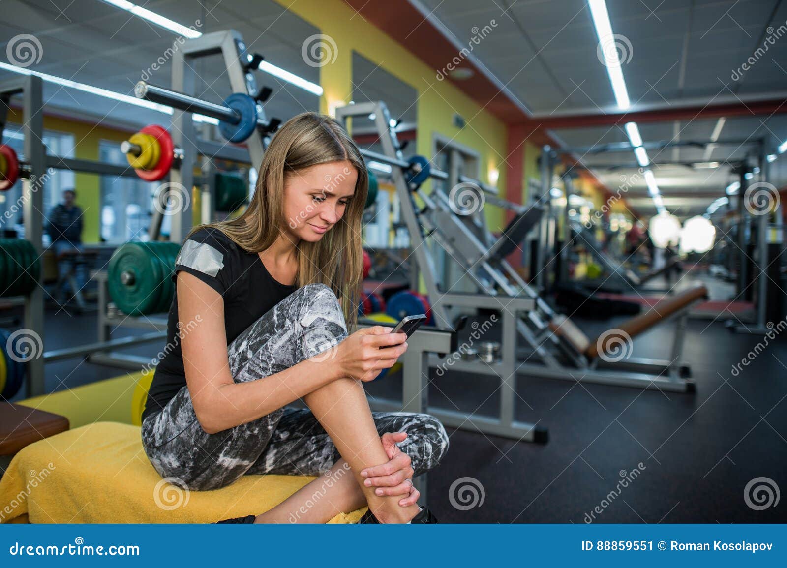 Young Woman Using Phone in Gym. Stock Image - Image of beautiful ...