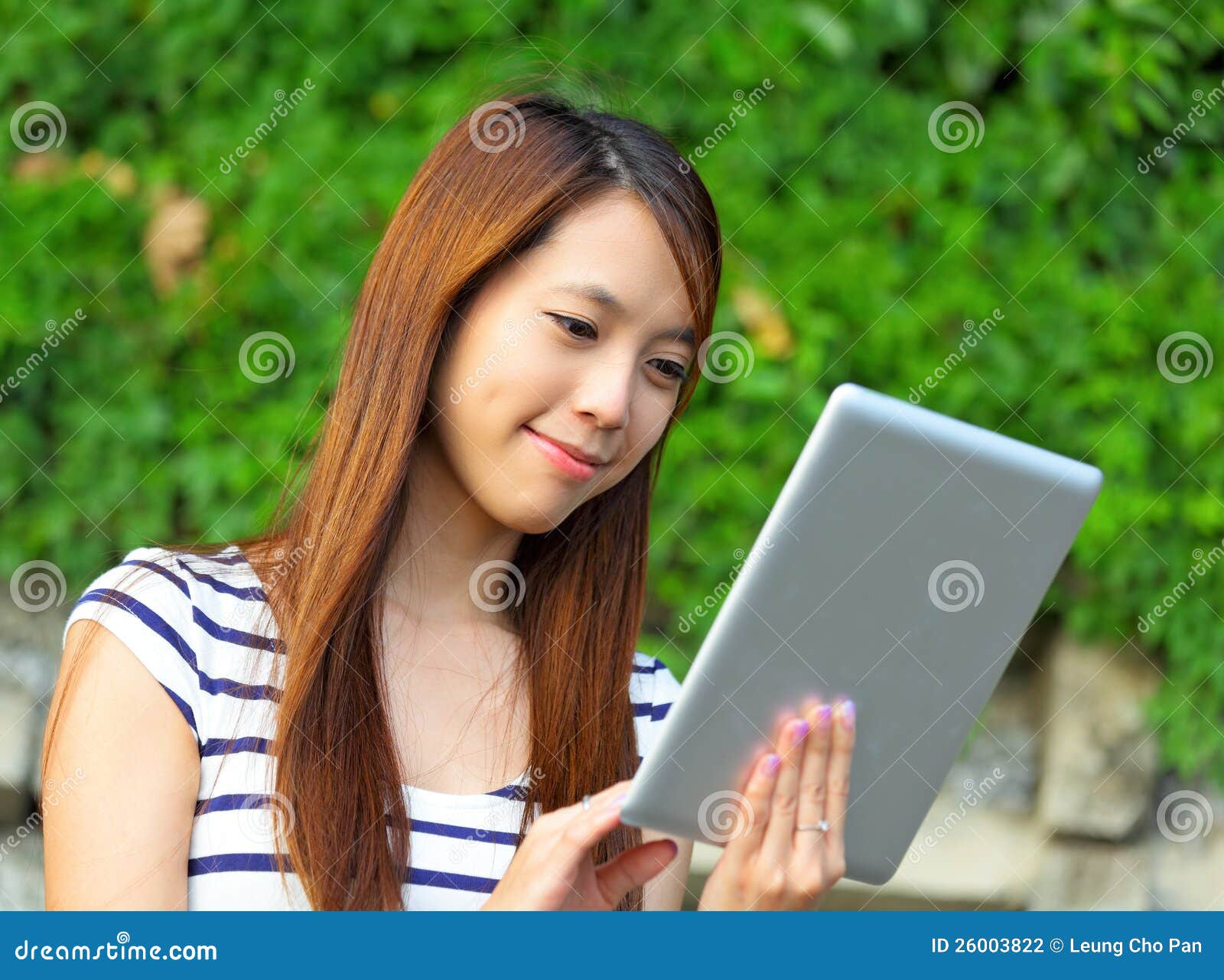 Young woman using tablet stock photo. Image of pretty - 26003822