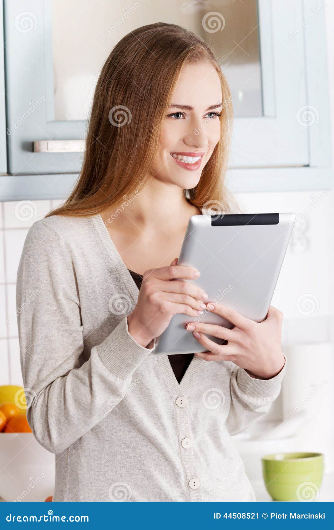 Young Woman Using a Tablet Computer at Home Stock Image - Image of ...