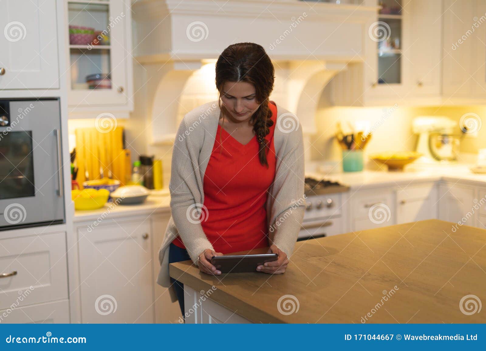 Young Woman Using Tablet Computer at Home Stock Image - Image of life ...