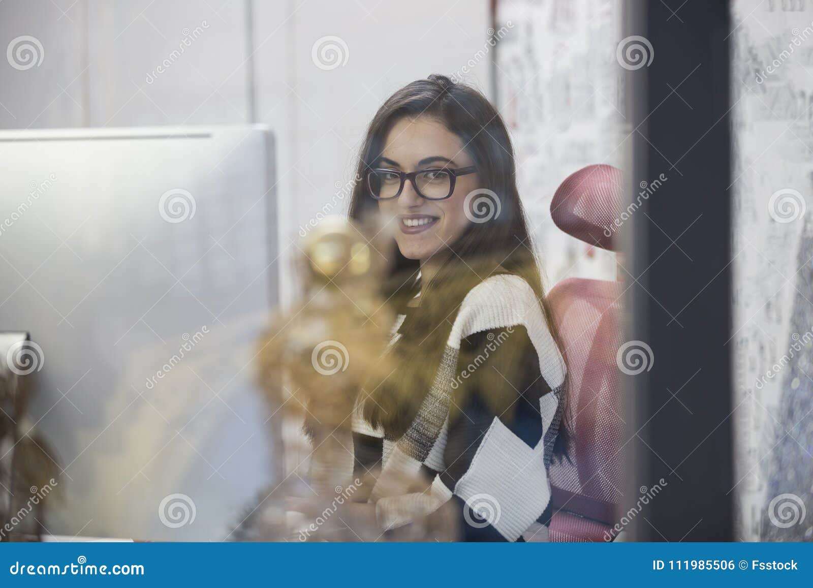 Young Woman Using Tablet Computer through the Window in Office Stock ... Young Woman Using Tablet Computer through the Window in Office Stock ...