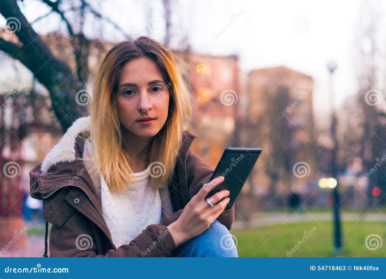Young Woman Using Tablet Outdoor Smiling Stock Image - Image of nature ...