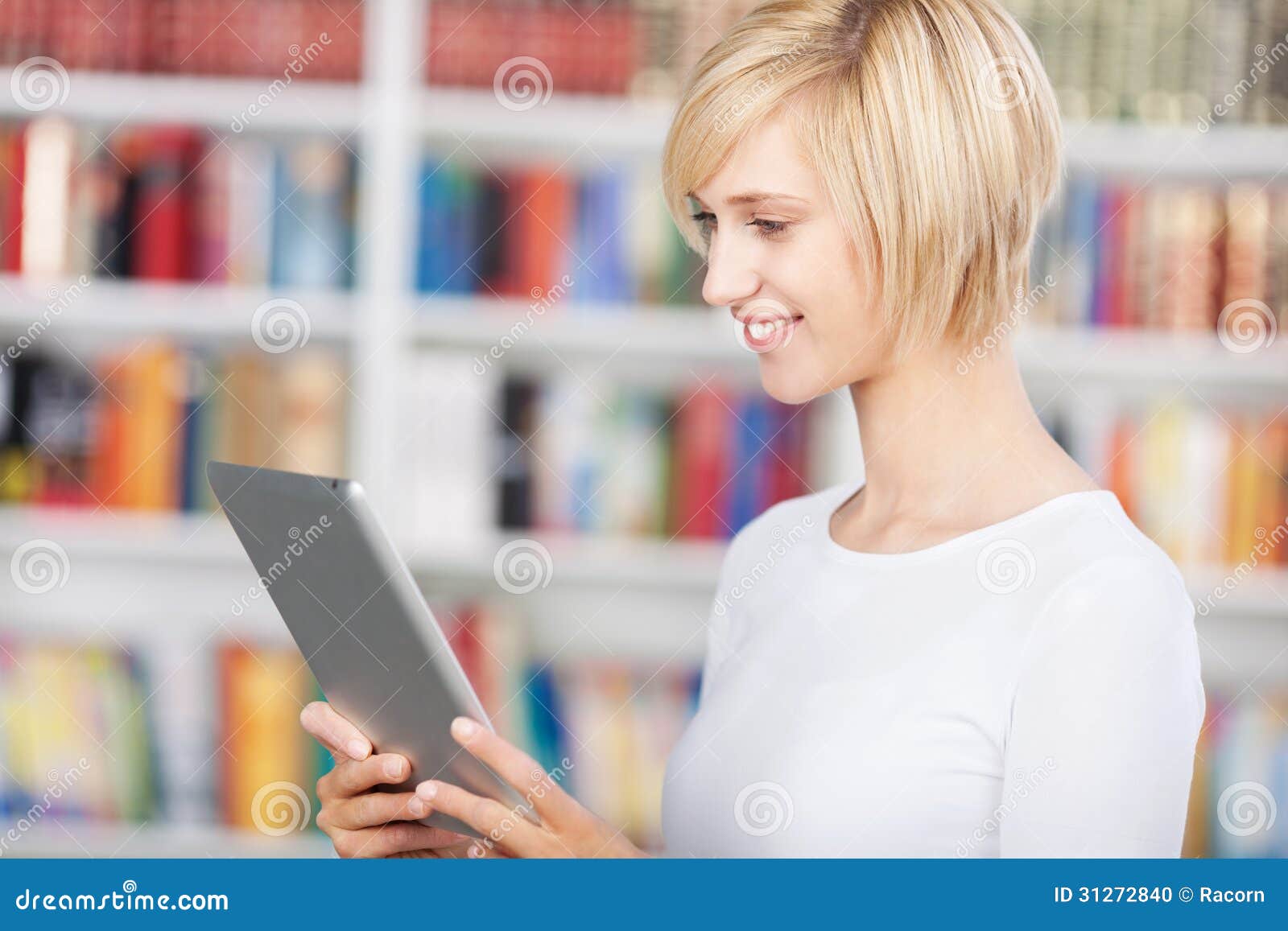 Young Woman Using Tablet-pc in Library Stock Photo - Image of digital ...