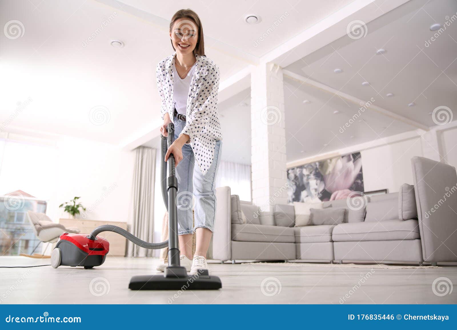 Young Woman Using Vacuum Cleaner Stock Photo - Image of female, hoover ...