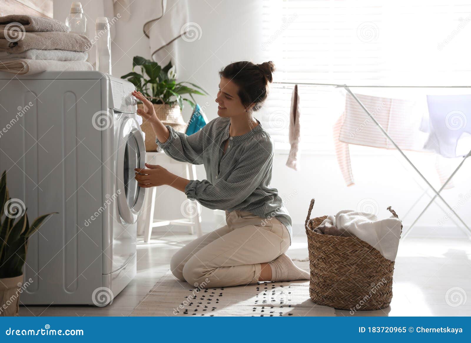 Young Woman Using Washing Machine Stock Image - Image of dryer, clean ...
