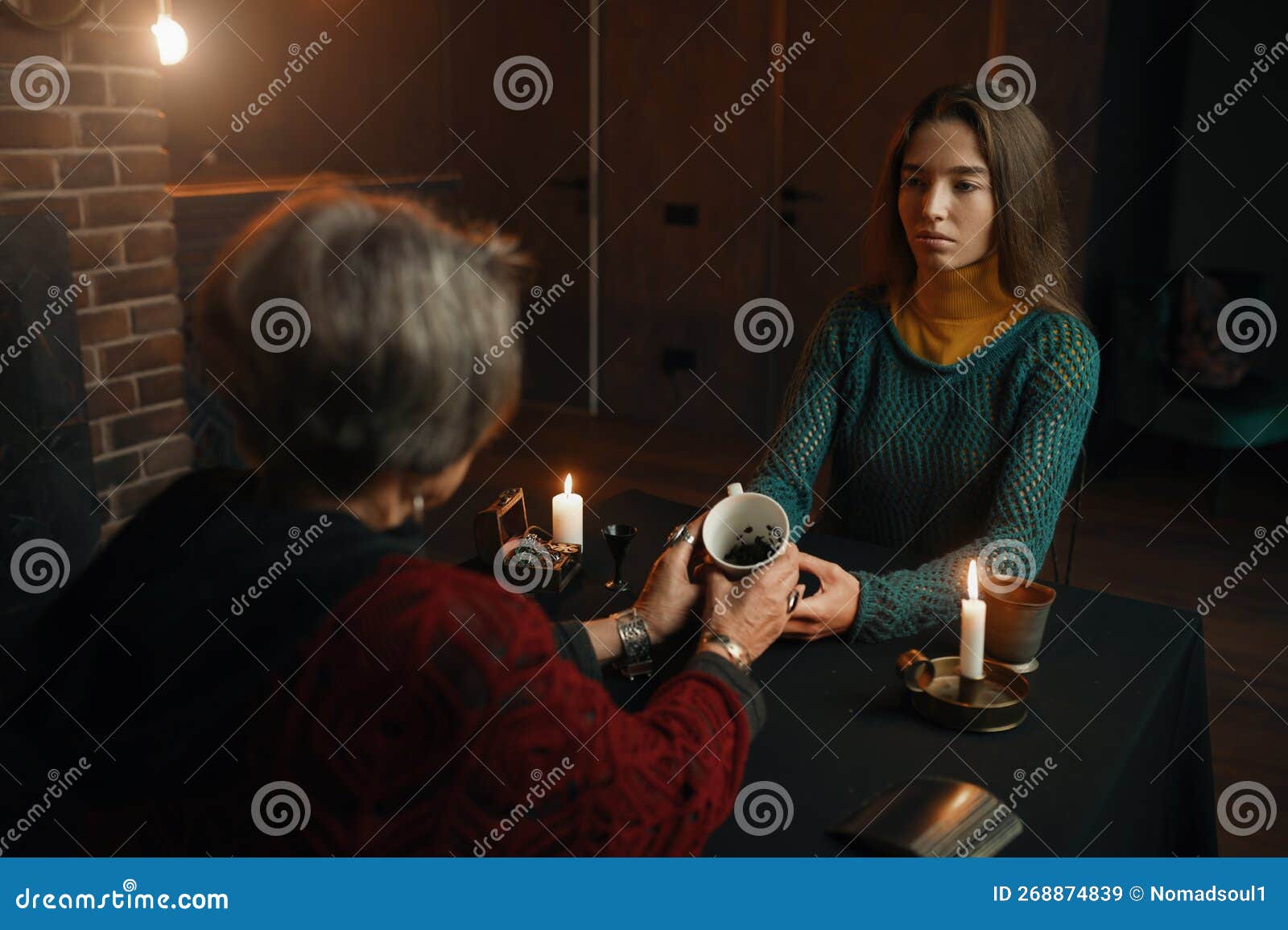 Young Woman Visiting Gypsy Witch for Divination on Coffee Grounds Stock ...