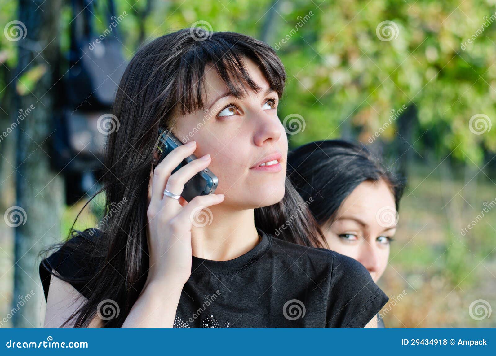 Young Woman Waiting for a Mobile Call Stock Photo - Image of listening ...