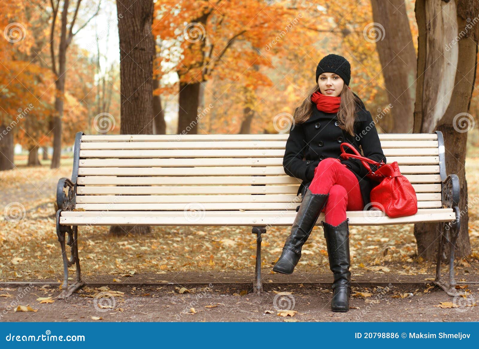 A Young Woman Waiting for Someone on a Bench Stock Photo - Image of ...