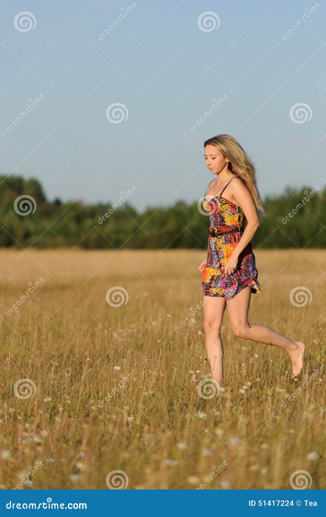 Young Woman Walk in the Field Stock Photo - Image of casual, pretty ...