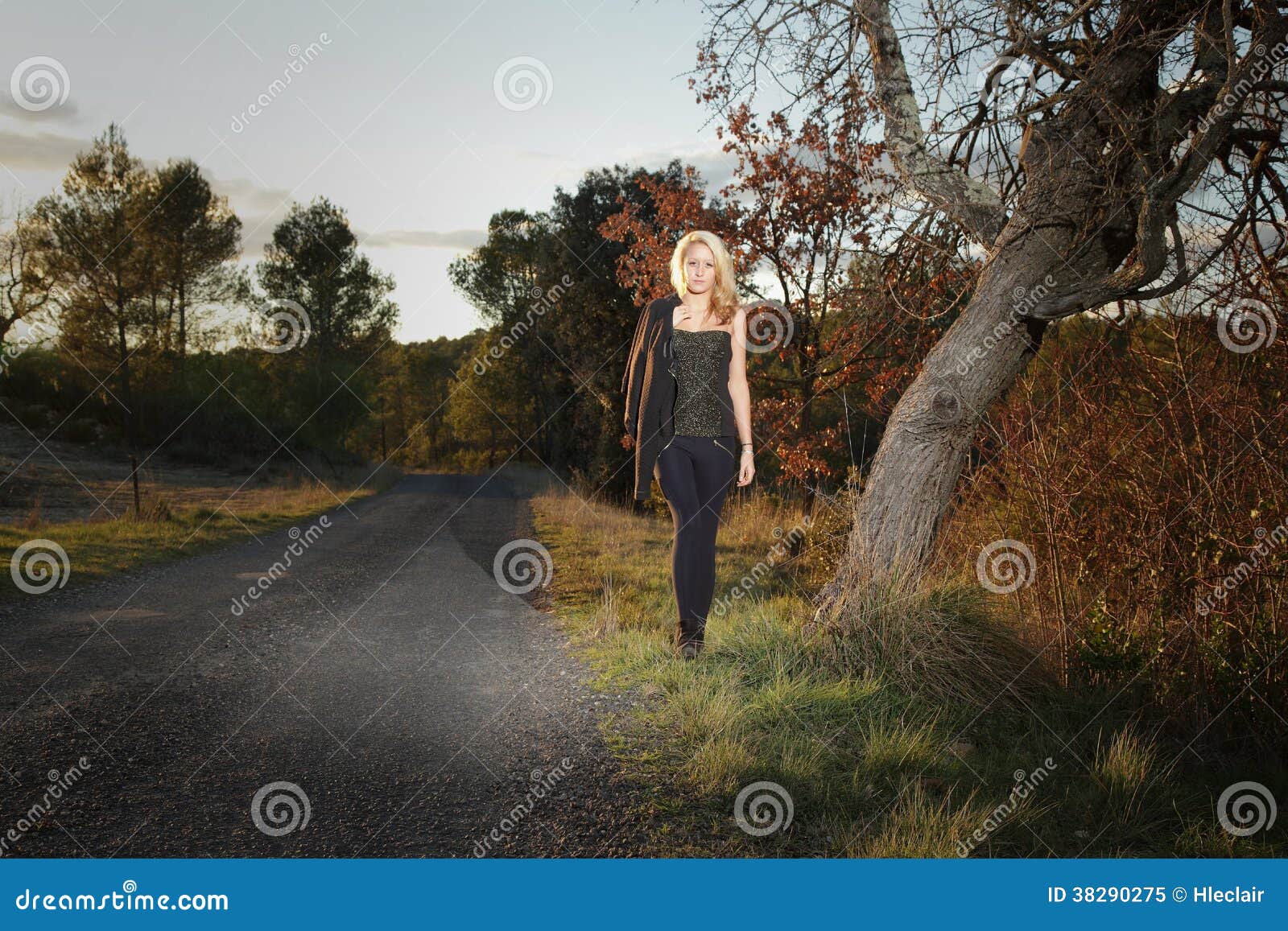 Young Woman Walking in the Countryside Stock Image - Image of walking ...