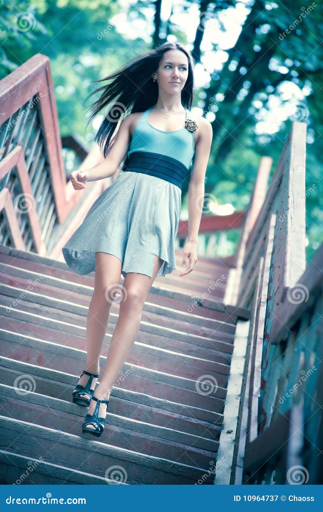 Young Woman Walking Downstairs Stock Image - Image of view, soft: 10964737