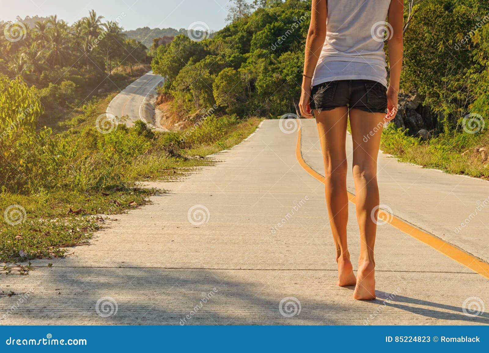 Young Woman Walking on Highway Stock Image - Image of life, girl: 85224823