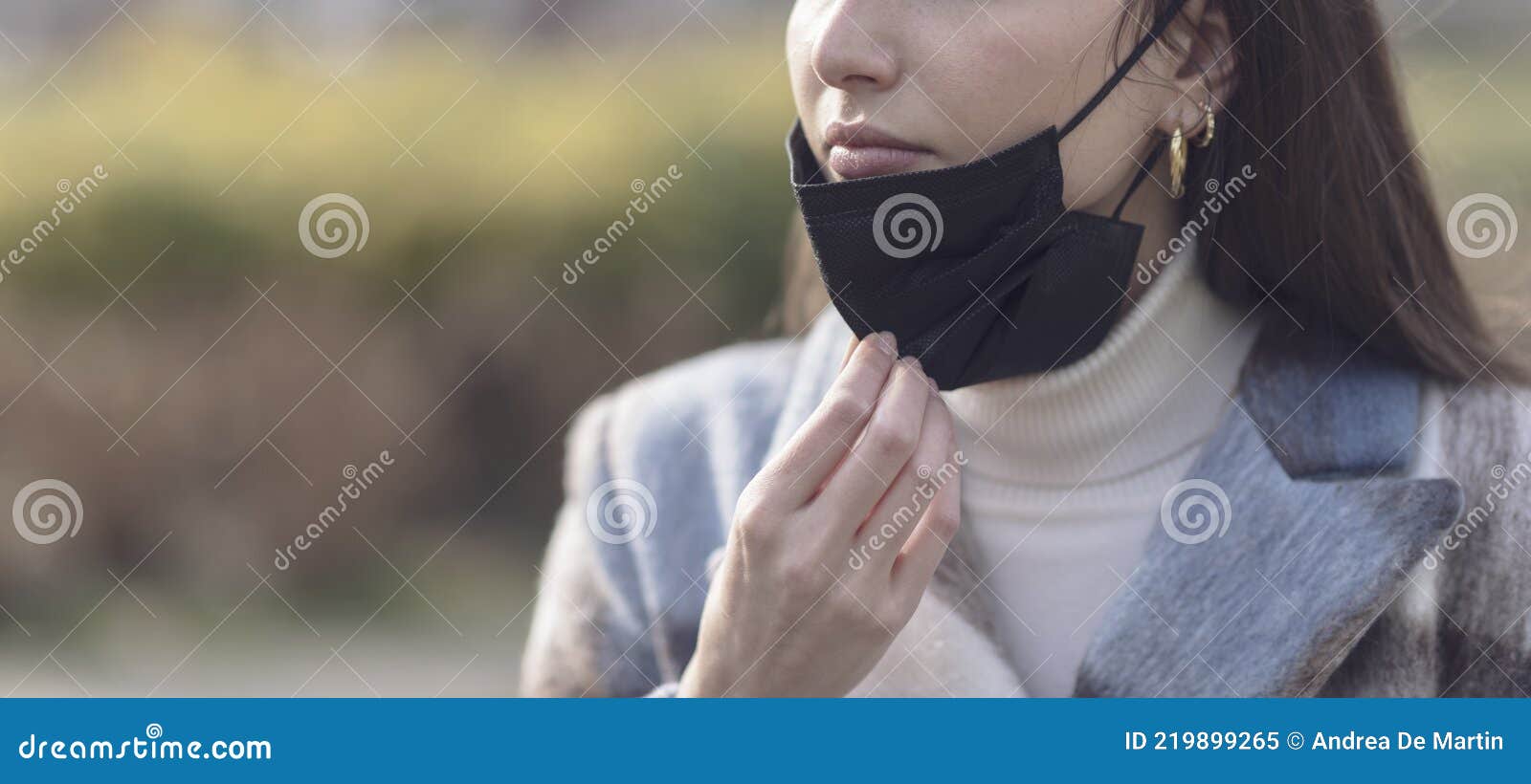 Young Woman Pulling Her Face Mask Down Outdoors Stock Image - Image of ...