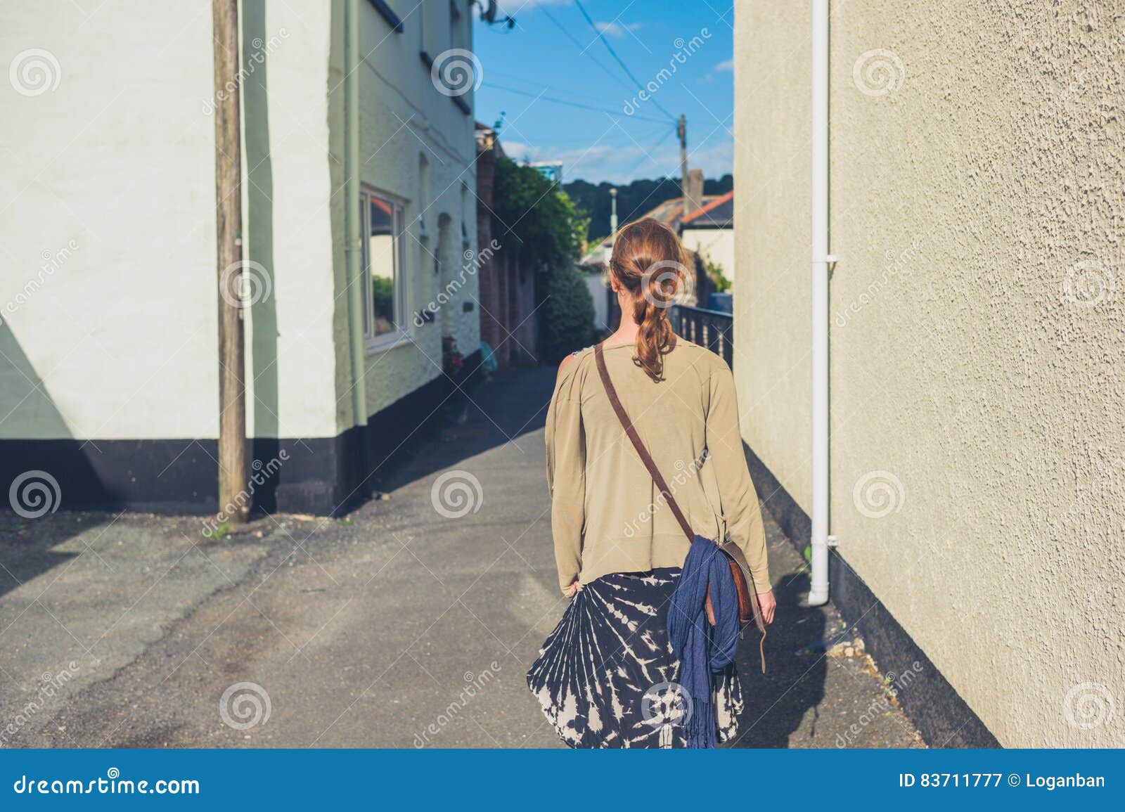 Young Woman Walking Outside Stock Image - Image of adult, summer: 83711777