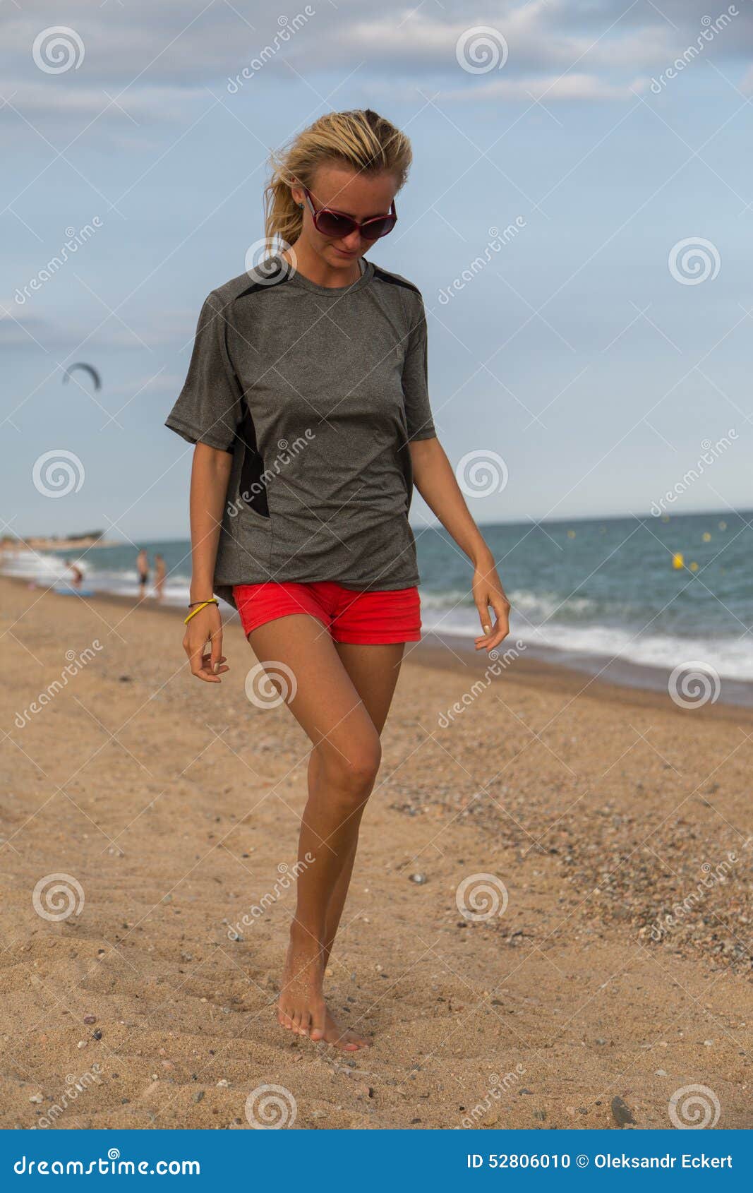 Young Woman Walking Relaxed Along the Beach Stock Photo - Image of ...