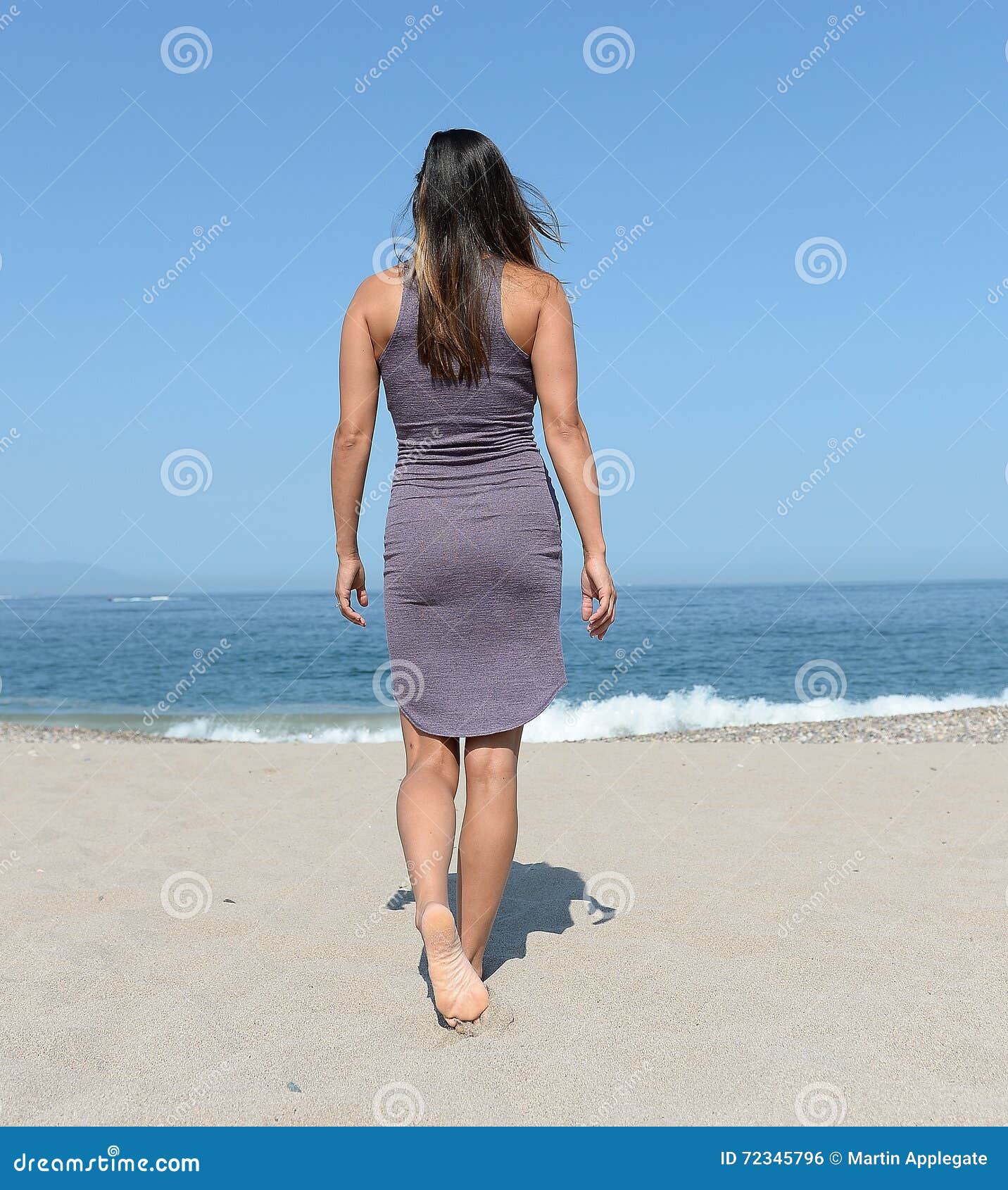 Young Woman Walking on Sandy Beach Stock Photo - Image of smiling, sand ...