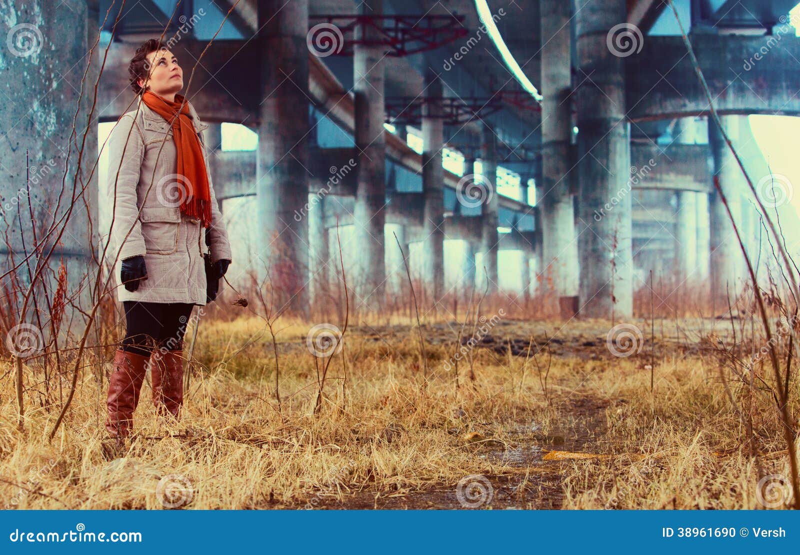 Young Woman Walking Under the Bridge Stock Photo - Image of model ...