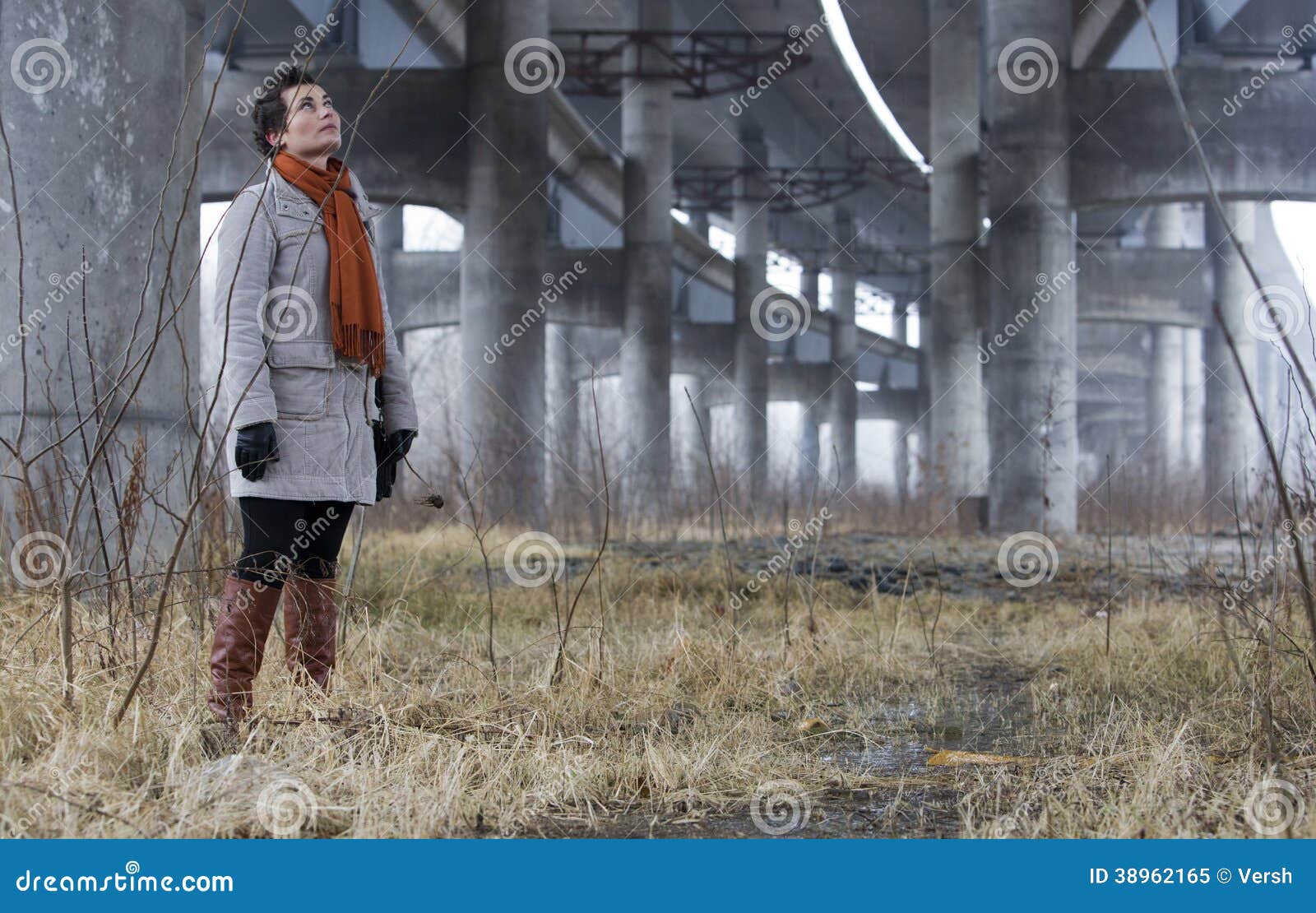 Young Woman Walking Under the Bridge Stock Image - Image of female ...