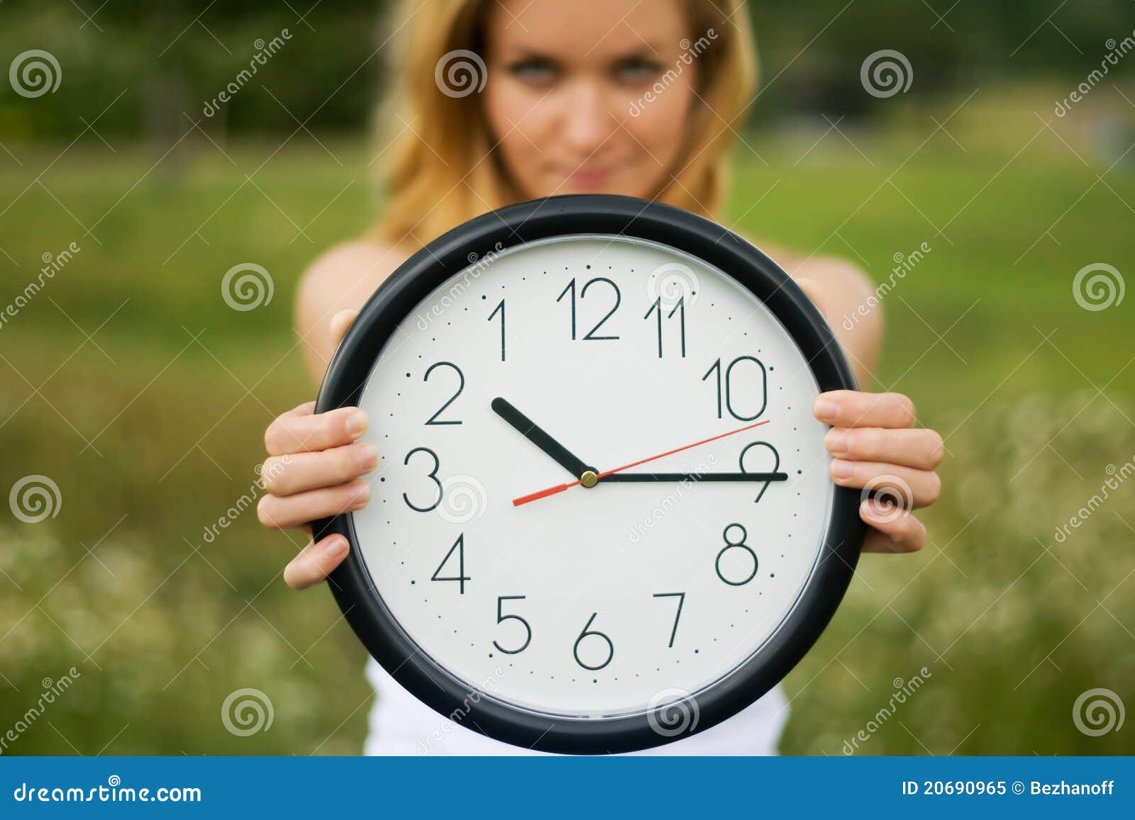 Young Woman with a Wall Clock Stock Image - Image of clock, activity ...