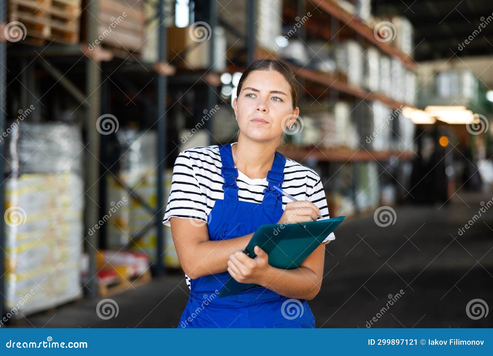 Young Woman Warehouse Worker Checking Documents Stock Image - Image of ...