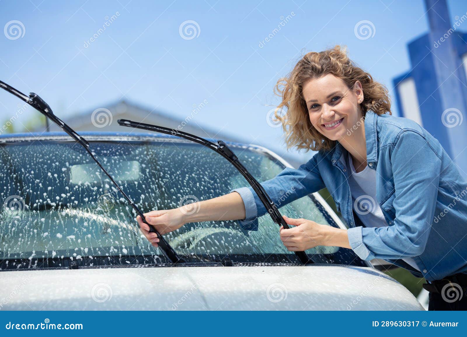 Young Woman Washing Car Window Stock Image - Image of sympathetic ...
