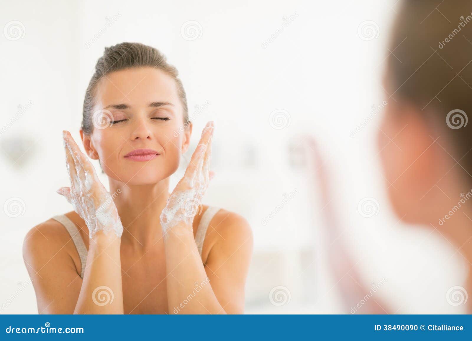 Young Woman Washing Face in Bathroom Stock Photo - Image of bathroom ...