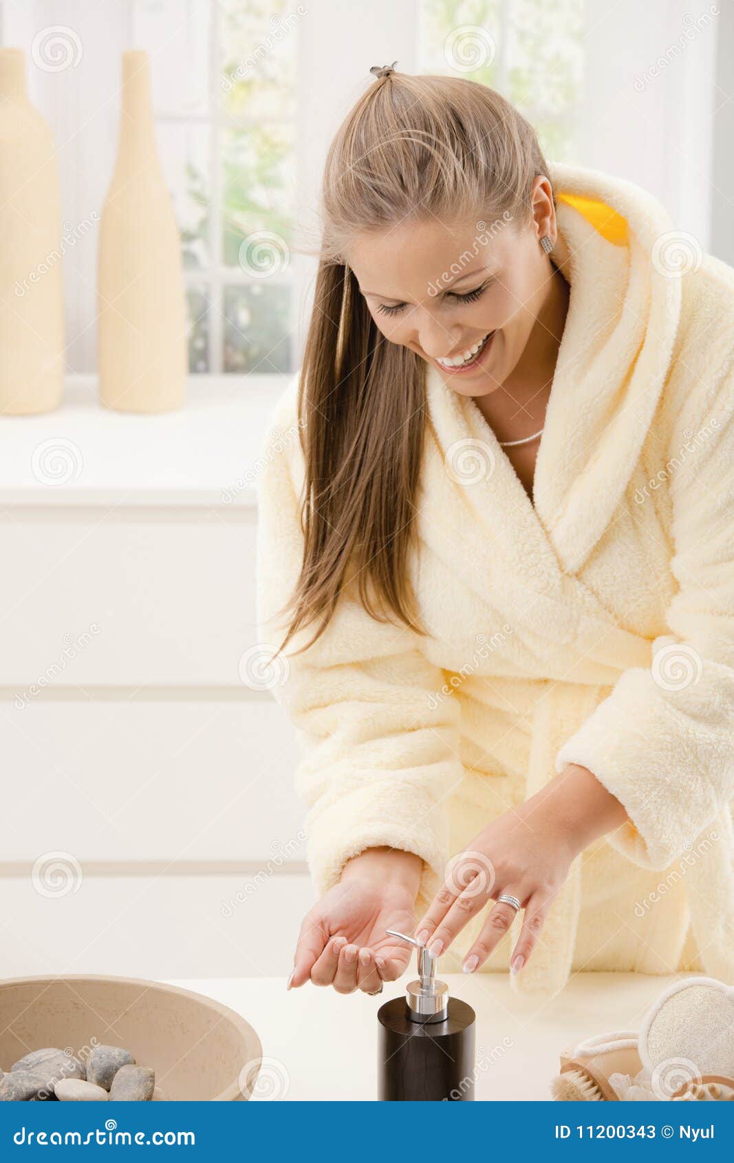 Young woman washing hands stock image. Image of cosmetics - 11200343