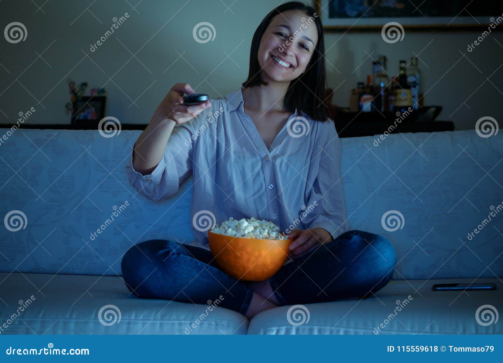 Young Woman Watching Her Favorite Program on Tv Stock Photo - Image of ...