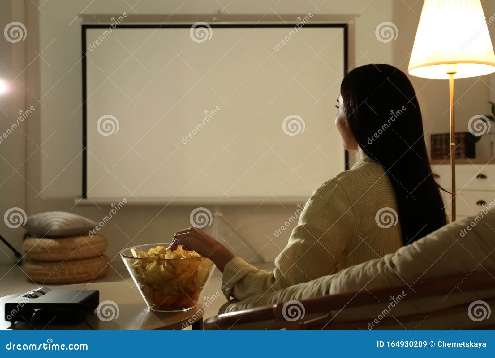 Young Woman Watching Movie Using Video Projector Stock Image - Image of ...