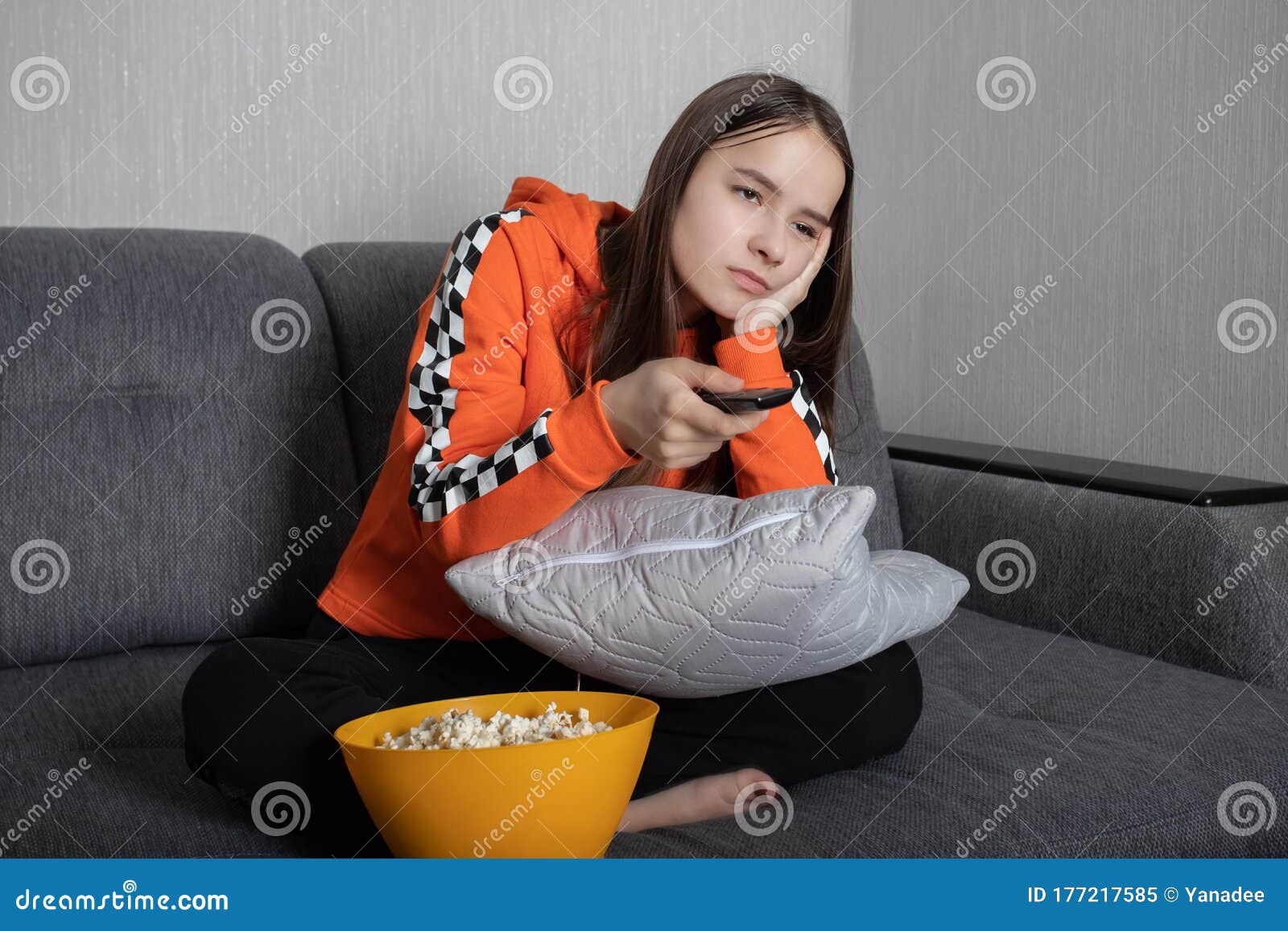 Young Woman Watching an Uninteresting TV Show Stock Image - Image of ...
