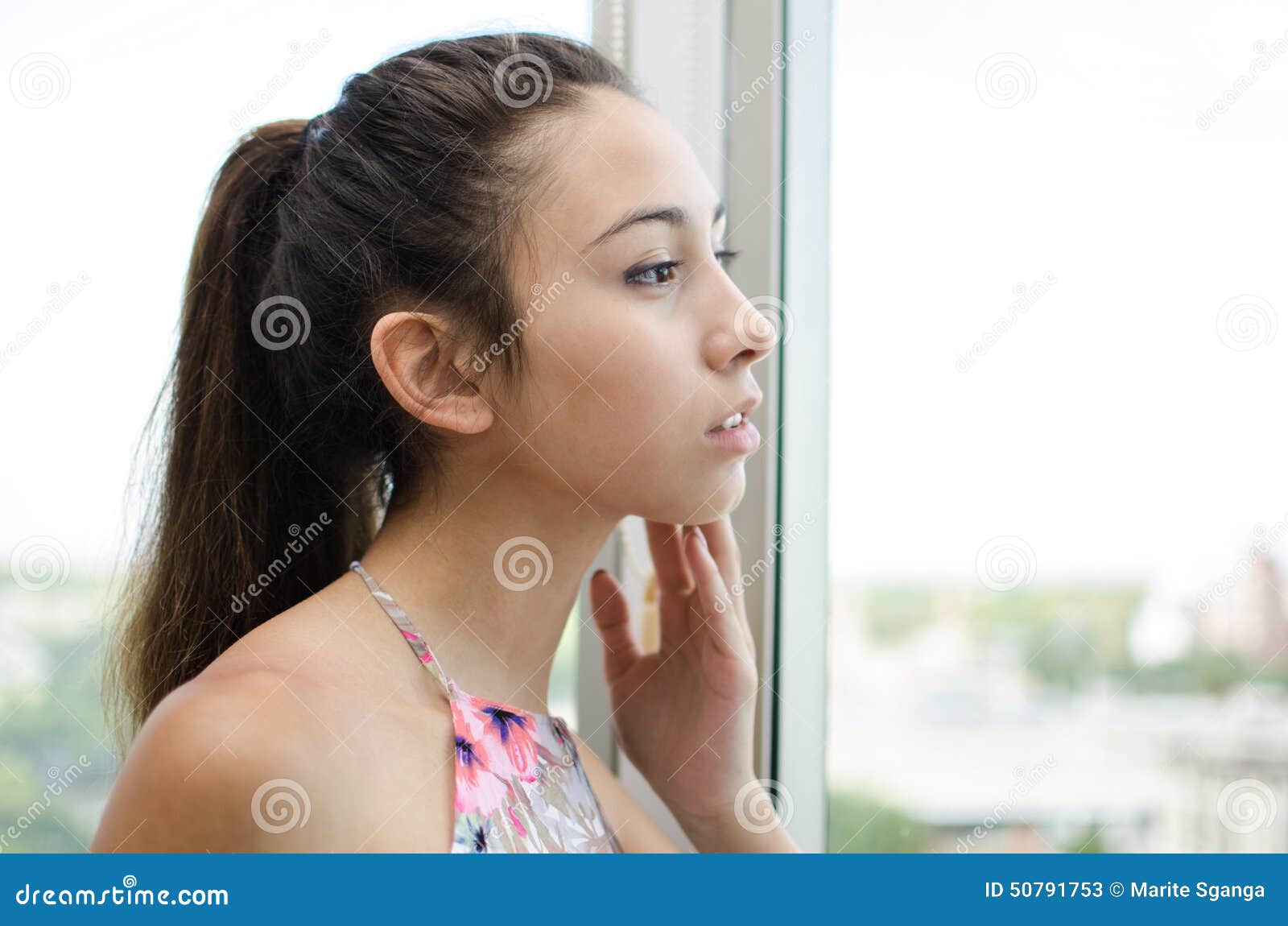 Young Woman Watching through a Window Stock Image - Image of beautiful ...