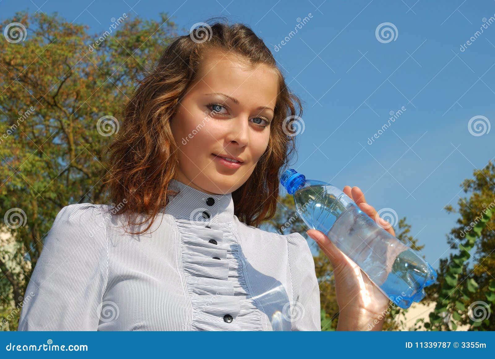 Young woman with water stock image. Image of drink, look - 11339787