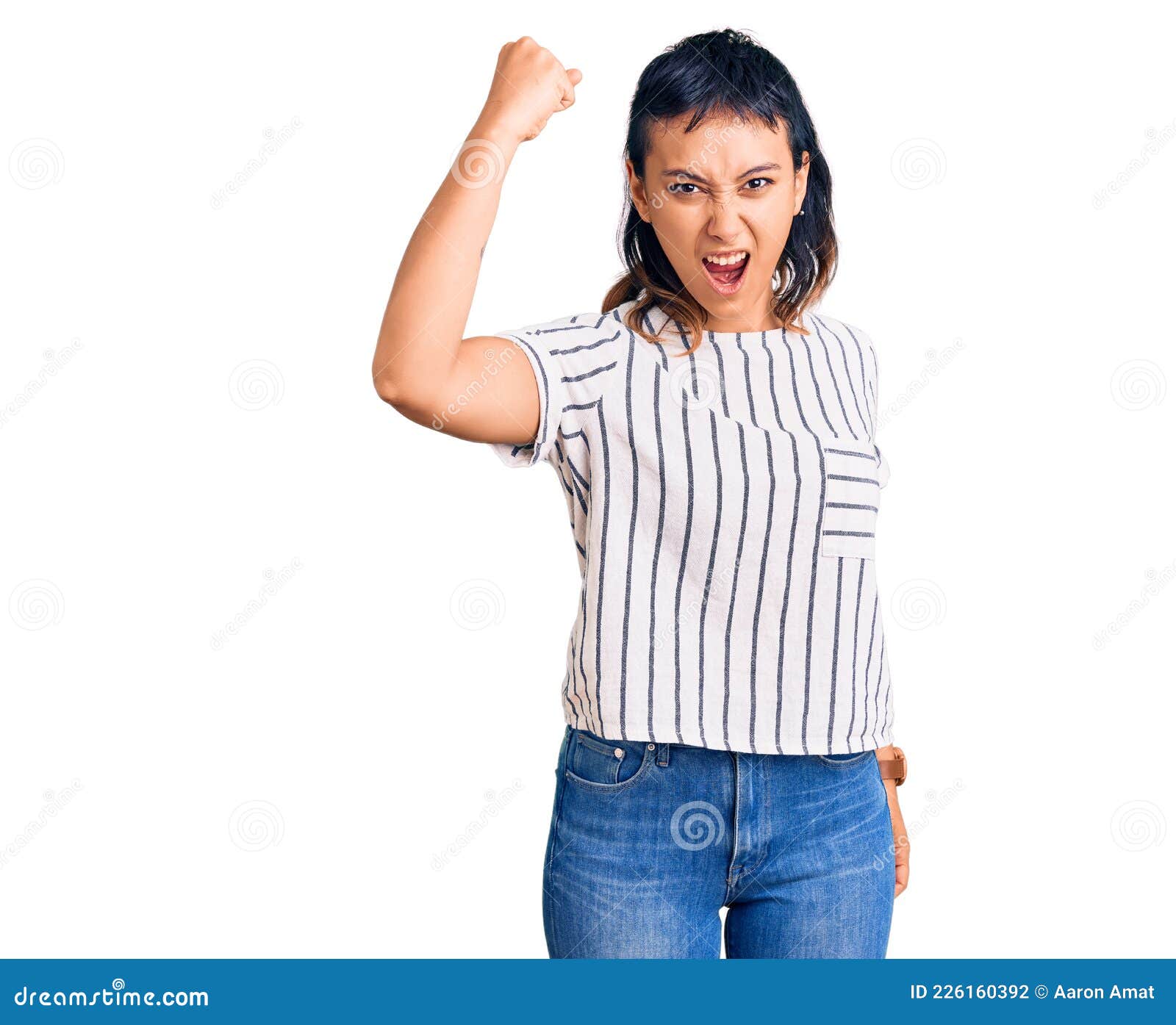 Young Woman Wearing Casual Clothes Angry And Mad Raising Fist