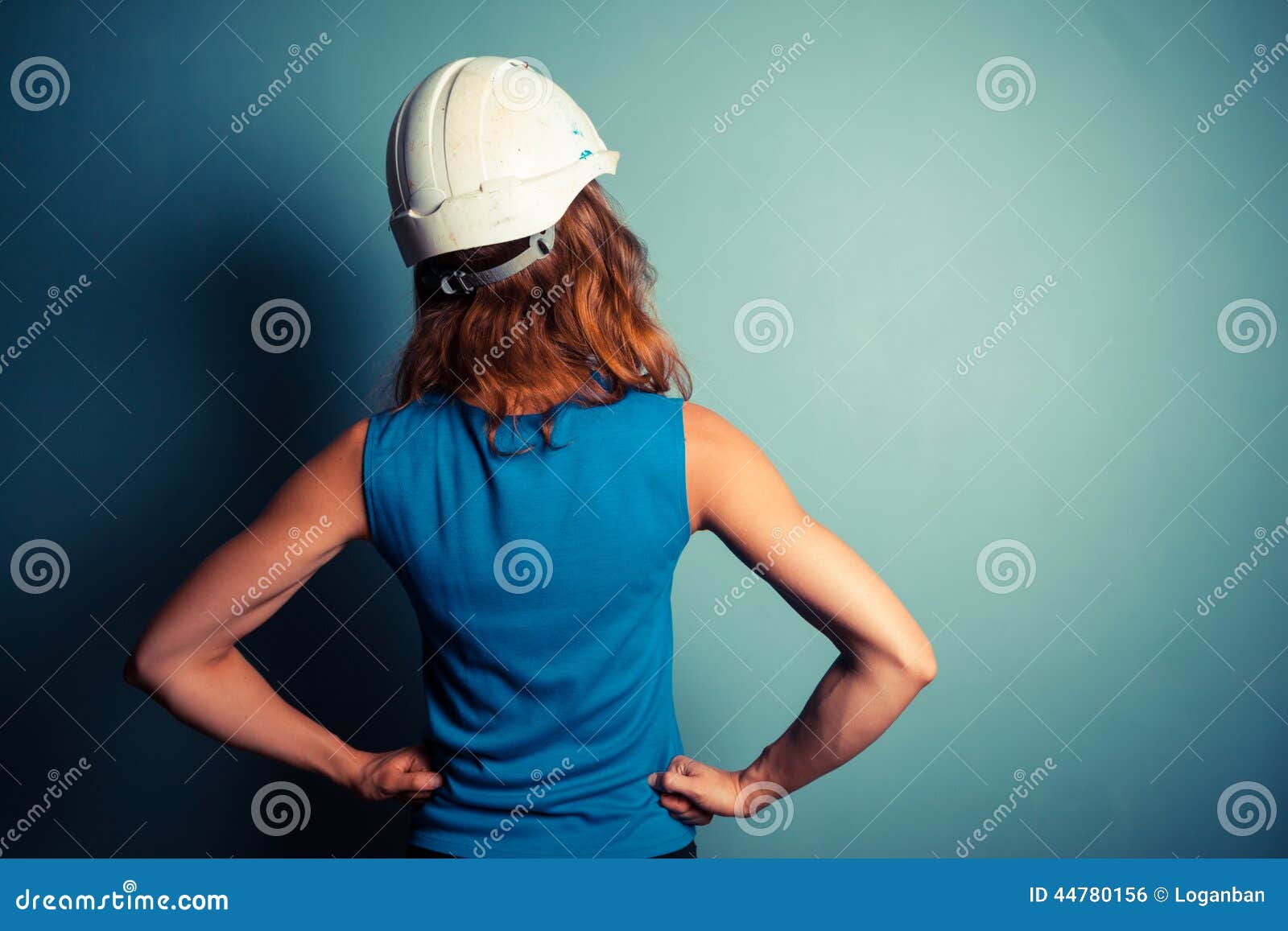 Young Woman Wearing Hard Hat Stock Photo - Image of construction, happy ...