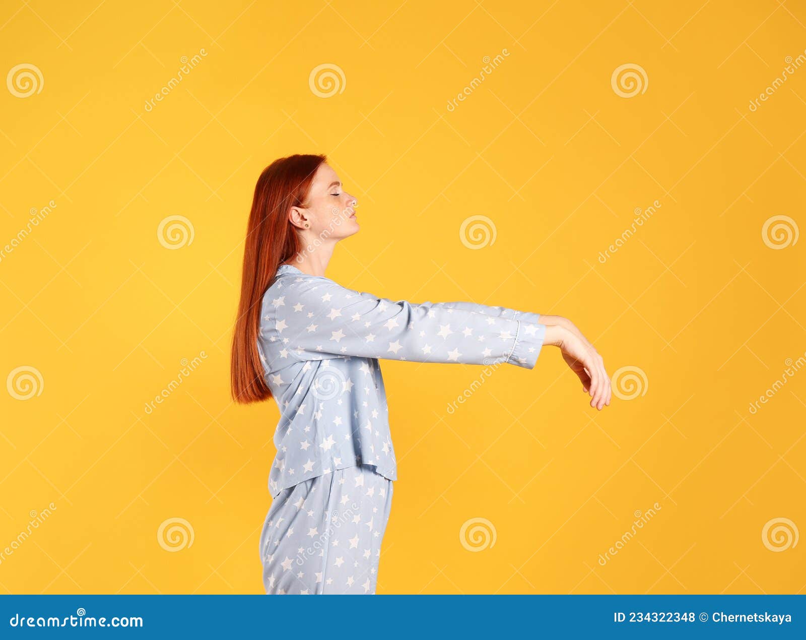 Young Woman Wearing Pajamas in Sleepwalking State on Yellow Background ... Young Woman Wearing Pajamas in Sleepwalking State on Yellow Background ...