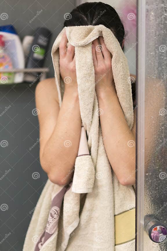 Young Woman Wipes after a Shower. Woman Wiping Herself with Towel after ... Young Woman Wipes after a Shower. Woman Wiping Herself with Towel after ...