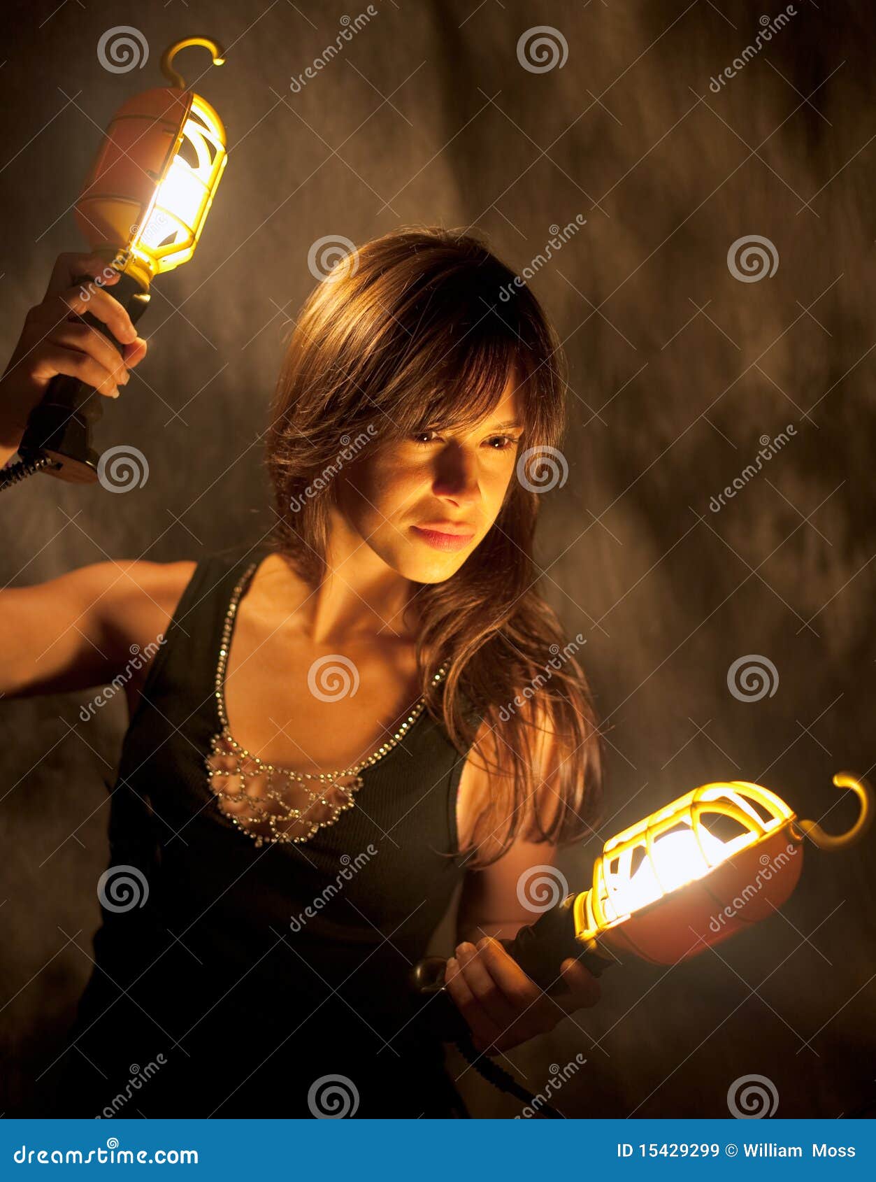 Young Woman with Work Lights Stock Image - Image of yellow, black: 15429299