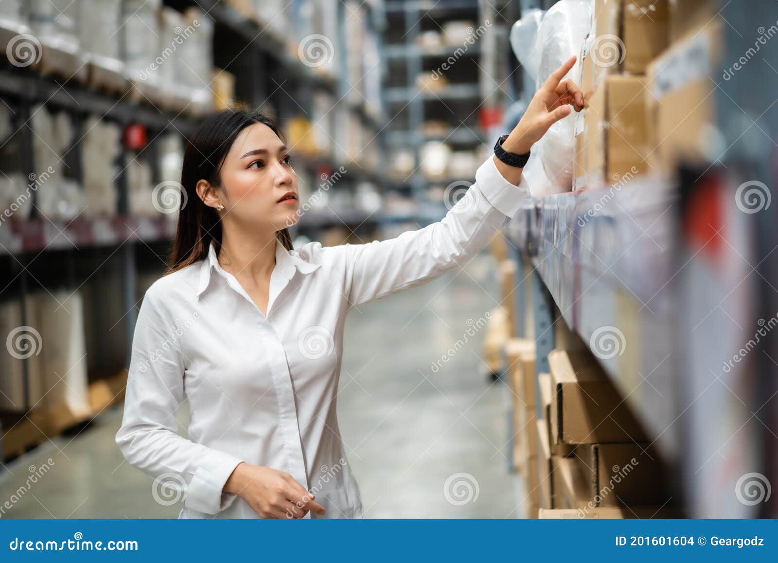 Young Woman Worker Checking Inventory in Warehouse Store Stock Photo ...
